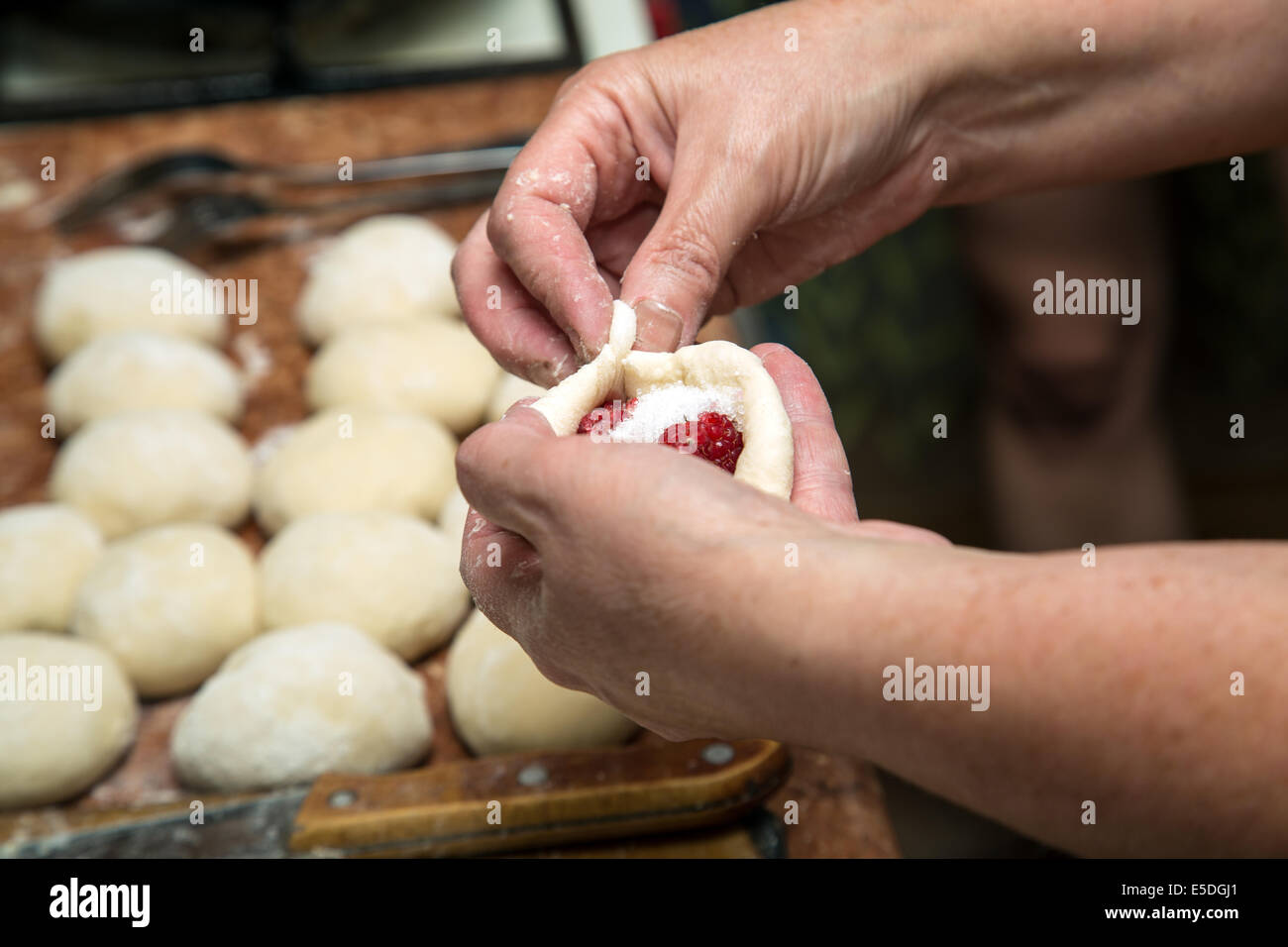 woman hands making cakes with berries Stock Photo - Alamy