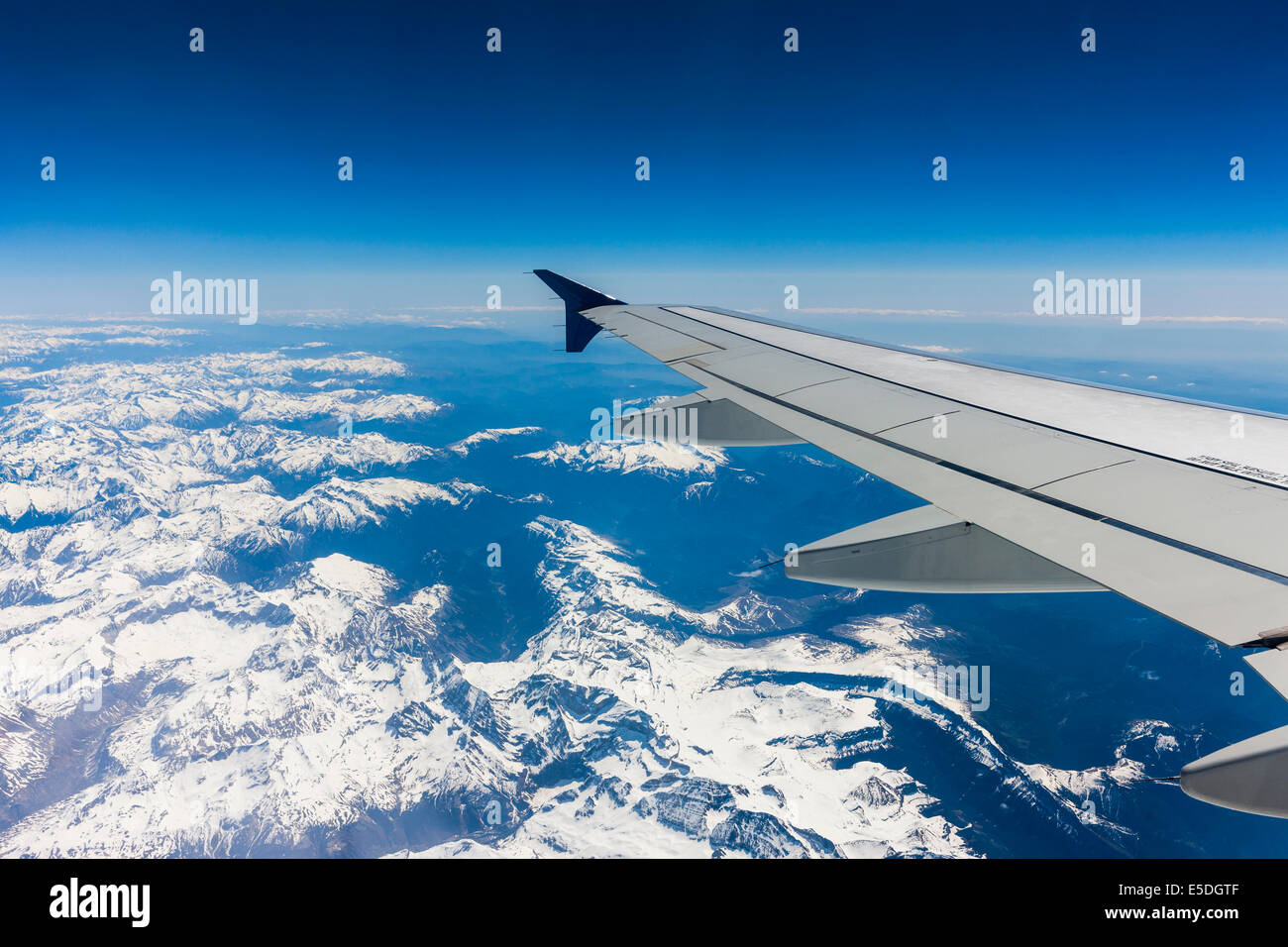 Aerial view, Flightplane over the Alps Stock Photo - Alamy