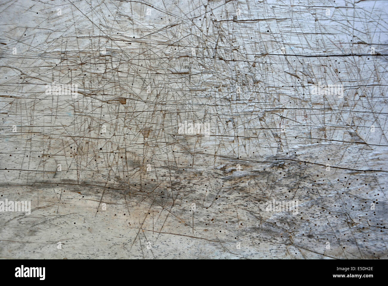 Withered and scratched wooden table, partial view Stock Photo - Alamy