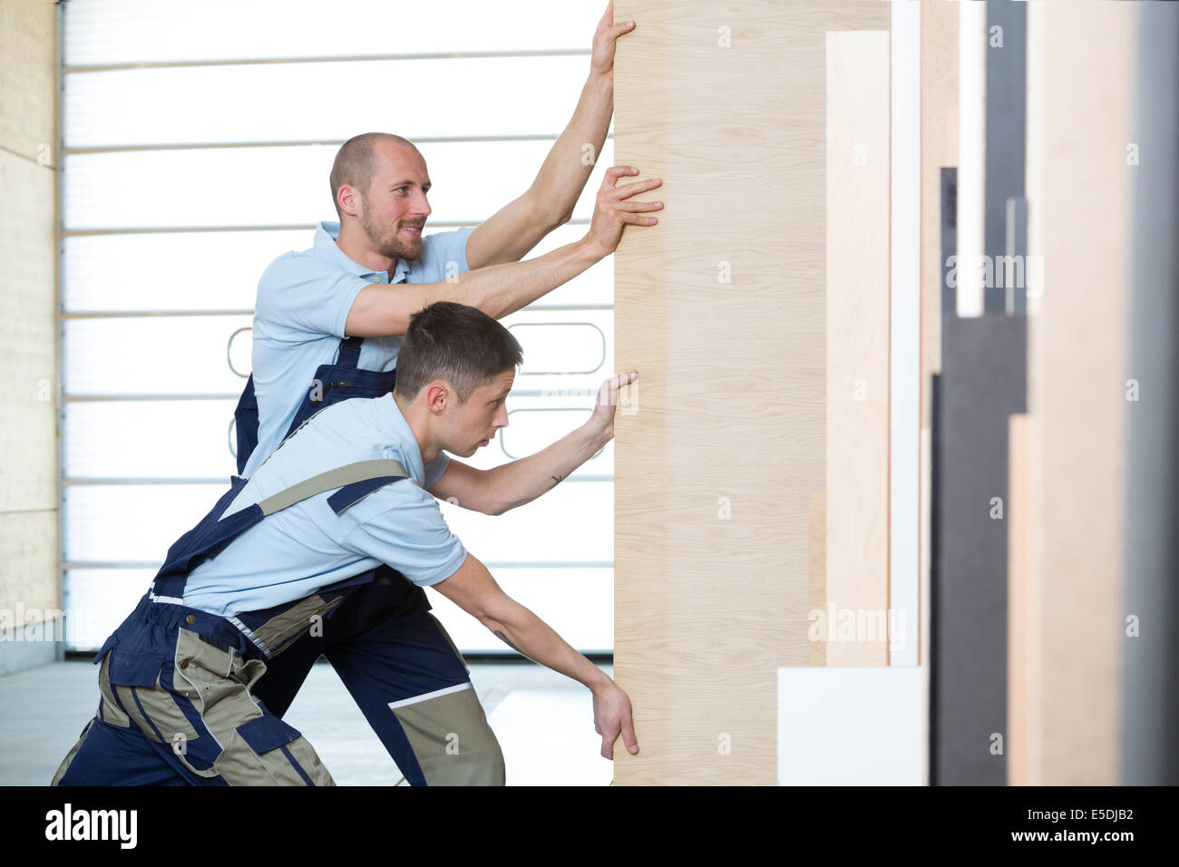 Two craftsmen at work Stock Photo - Alamy
