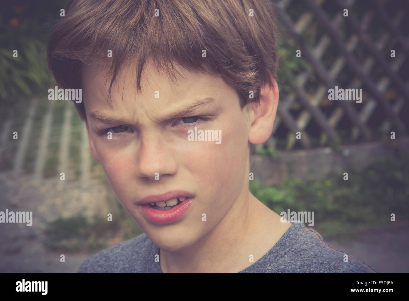 Portrait of angry boy Stock Photo - Alamy