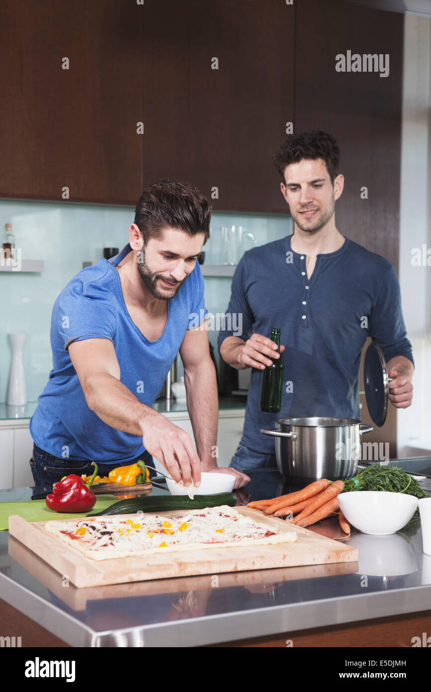 Portrait of two friends cooking together Stock Photo - Alamy