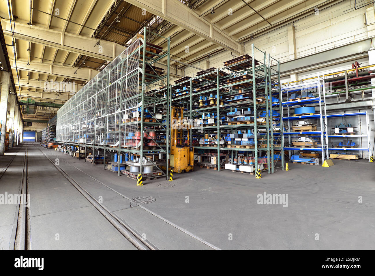 High racks in a storehouse Stock Photo - Alamy