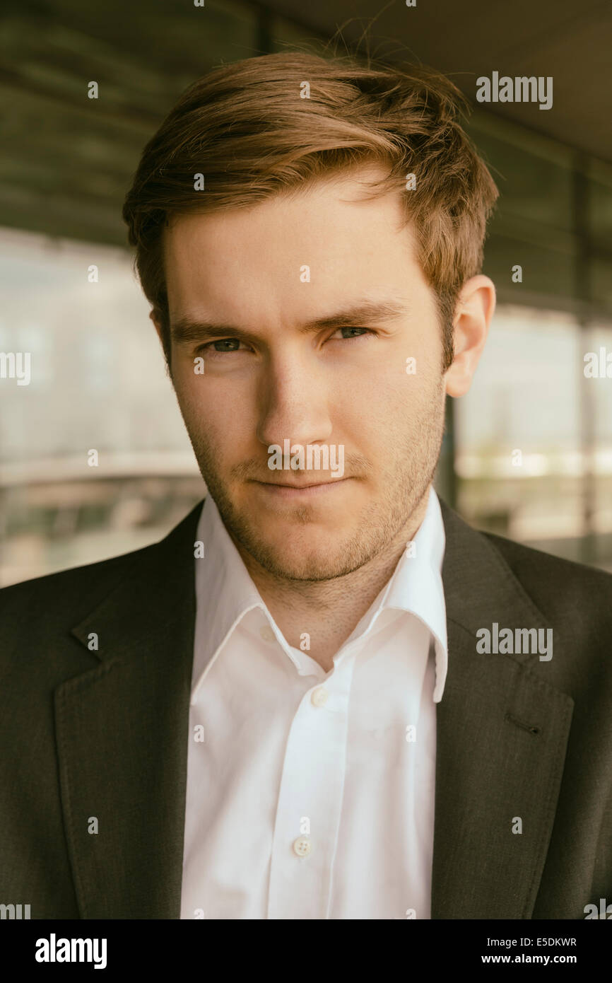 Portrait of serious businessman Stock Photo - Alamy