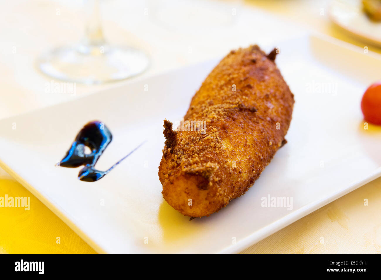 Traditional Spanish filled croquette Stock Photo - Alamy