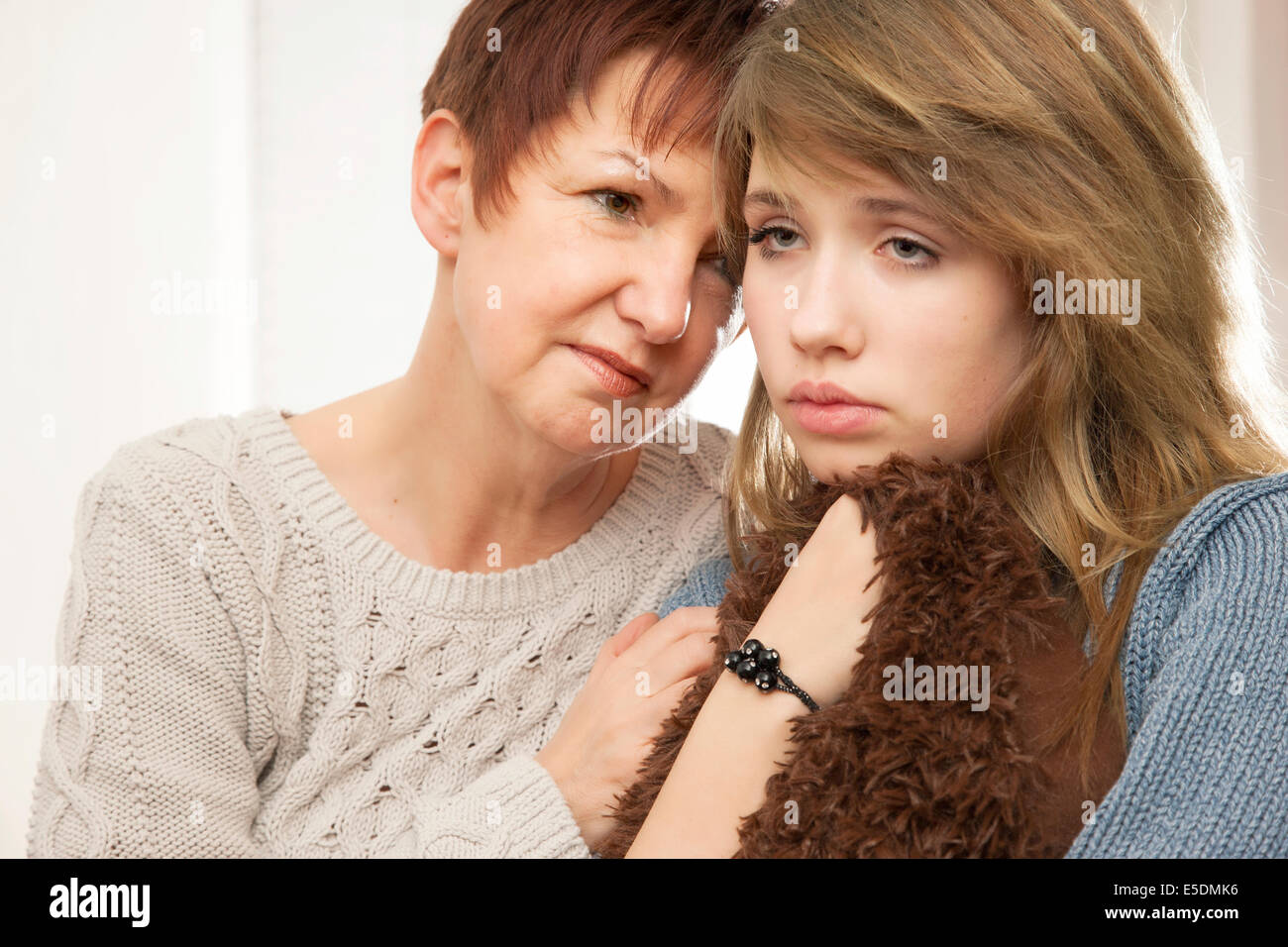 Germany, Berlin, Mother consoling daughter Stock Photo - Alamy