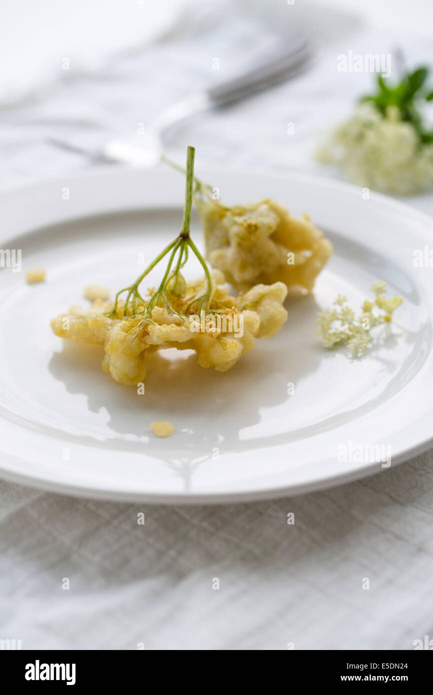 Deep-fried elderflowers on plate Stock Photo - Alamy