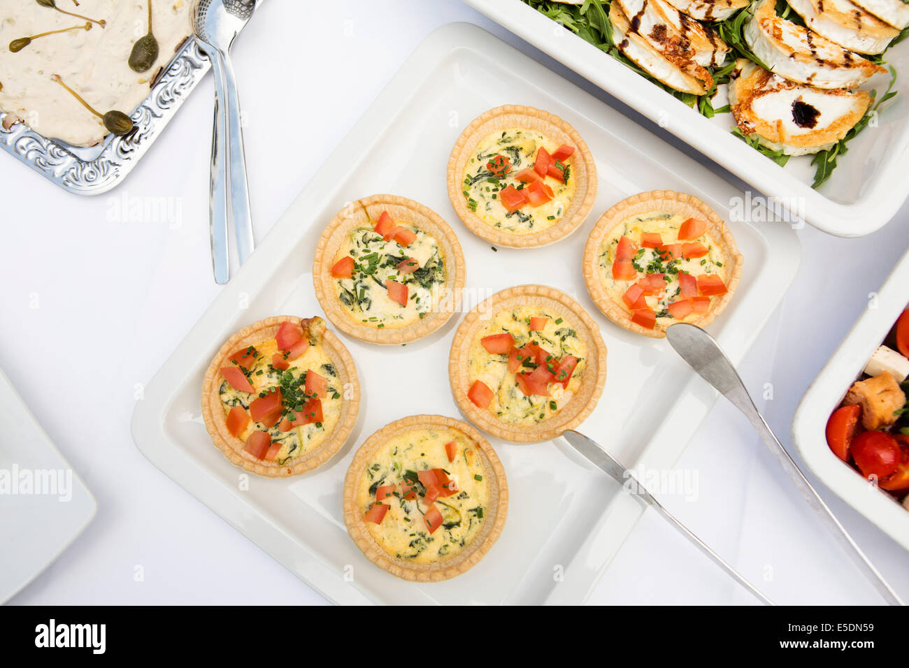 Mini Quiches on a buffet Stock Photo - Alamy