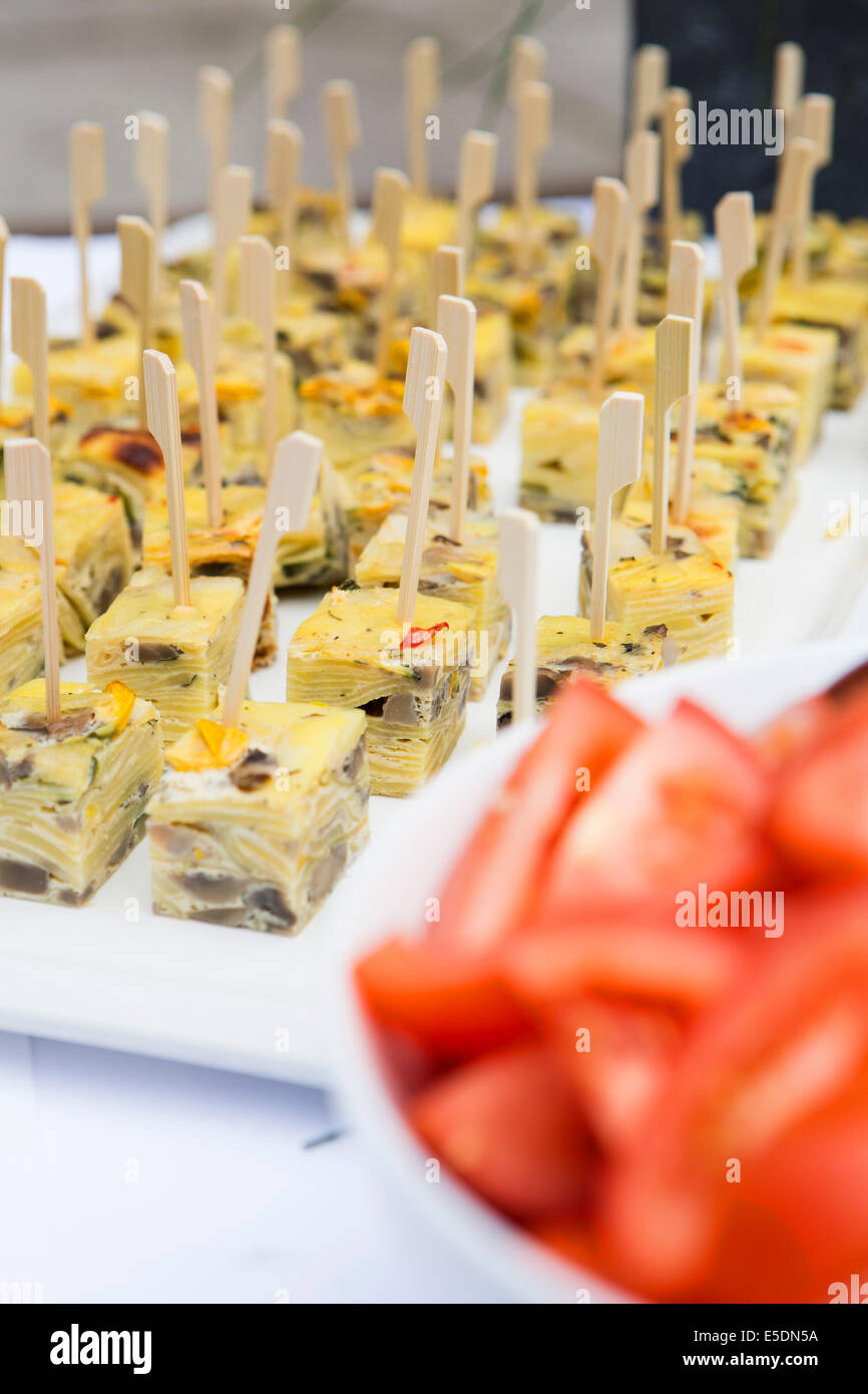 Potato tortillas with truffles on a buffet Stock Photo - Alamy