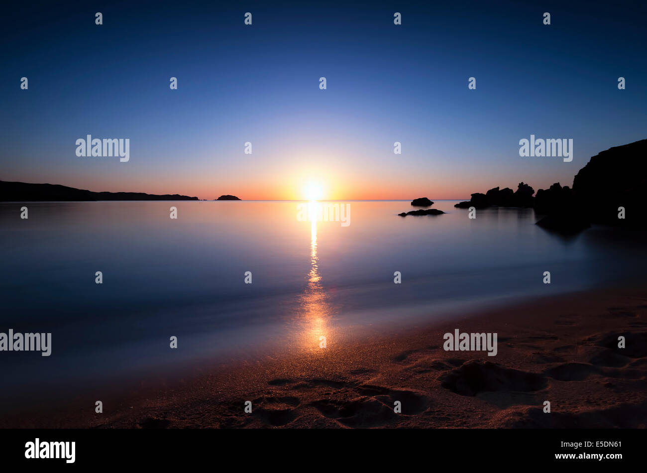 Spain, Menorca, Sunset at Playa de Cavalleria Stock Photo - Alamy
