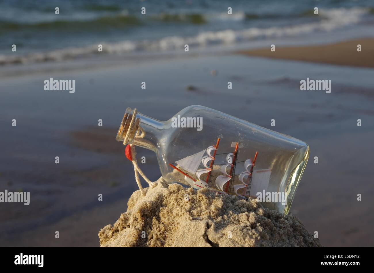 sailcloth ship in closed with cork bottle Stock Photo - Alamy