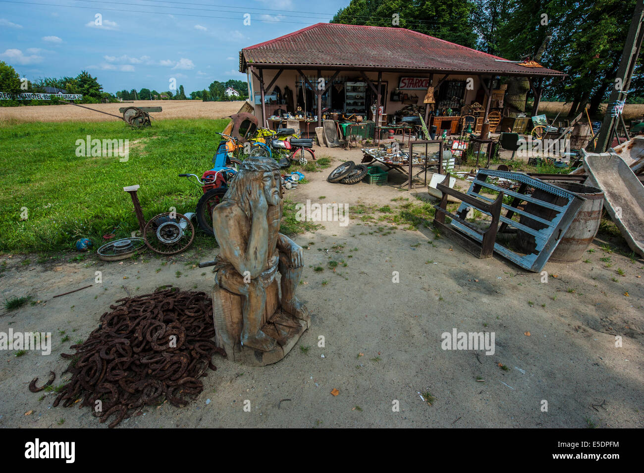 A second-hand goods and antique store at the road between Warsaw and ...