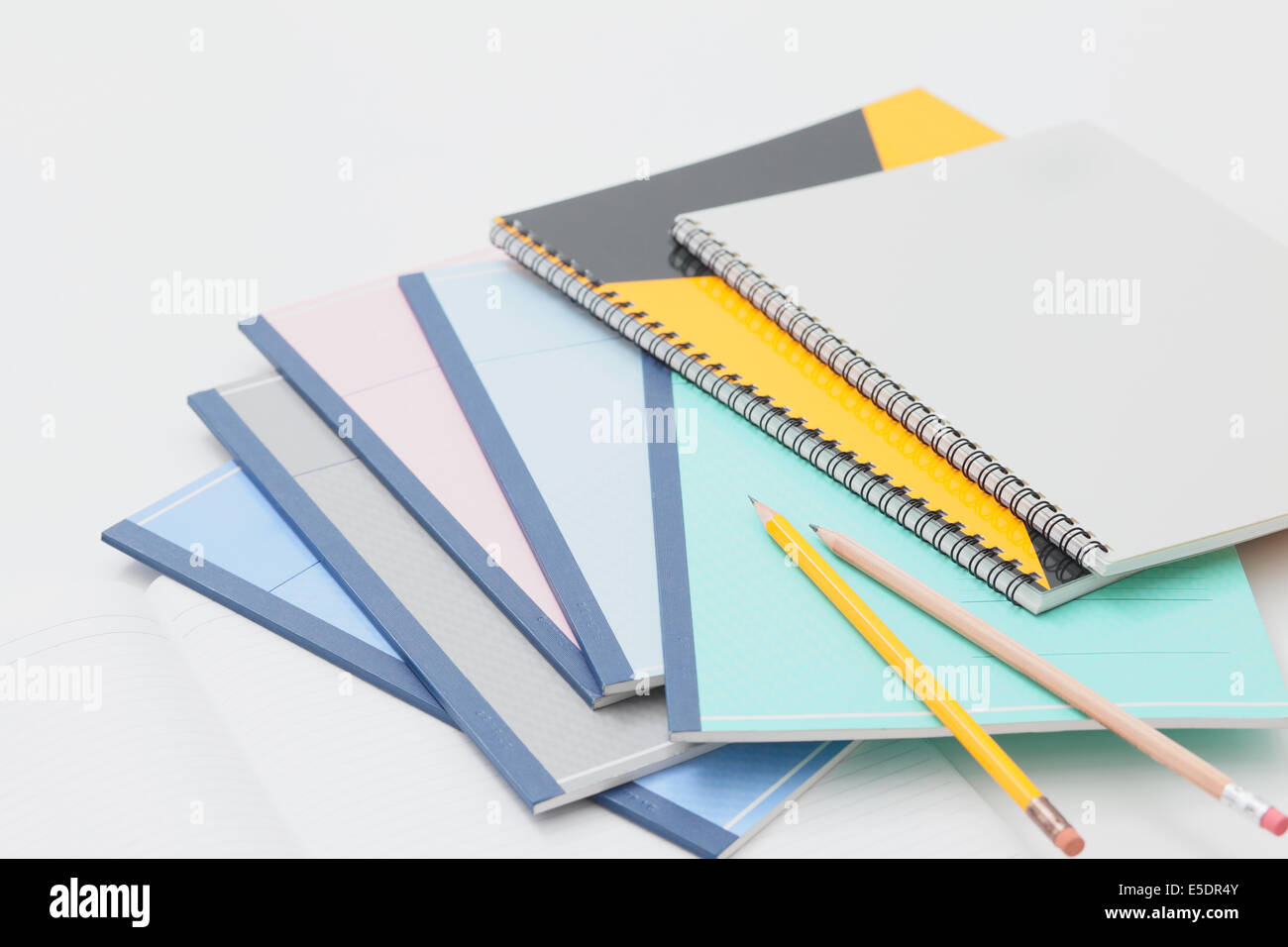 Pencils and notebooks Stock Photo - Alamy