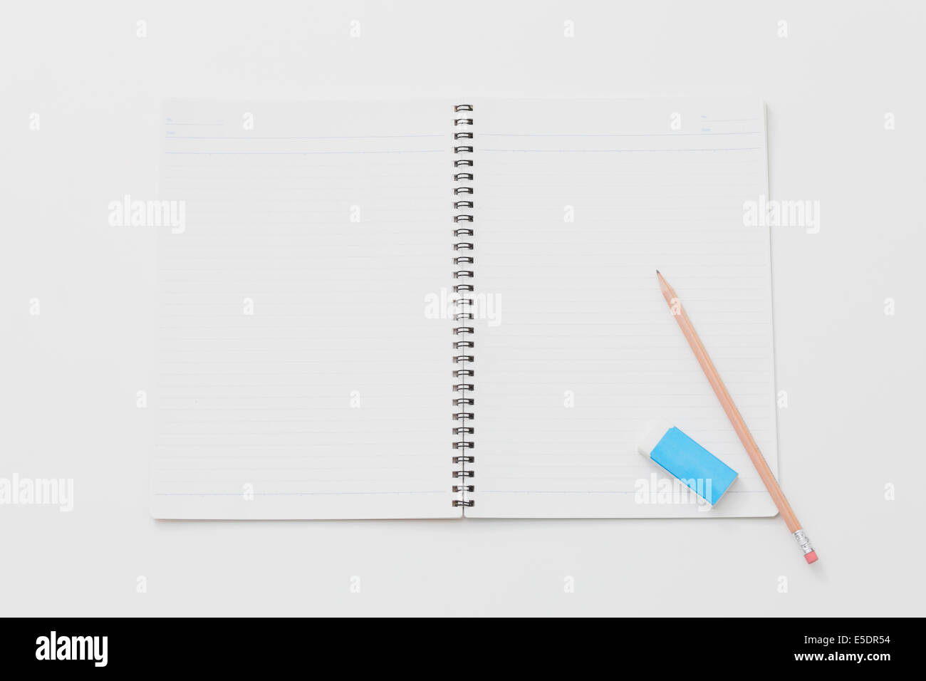 Notebook and pencil Stock Photo - Alamy