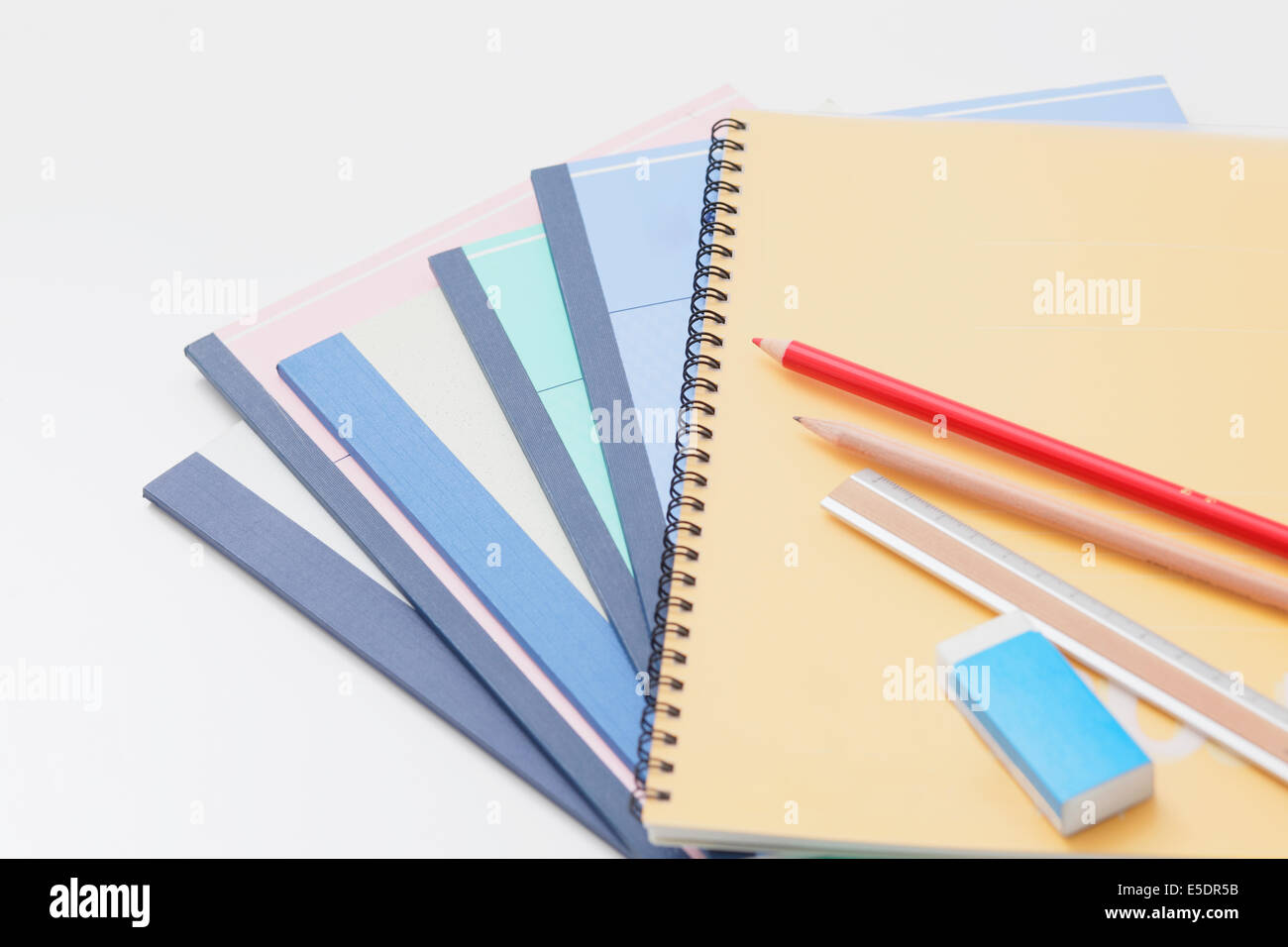 Pencils and notebooks Stock Photo - Alamy