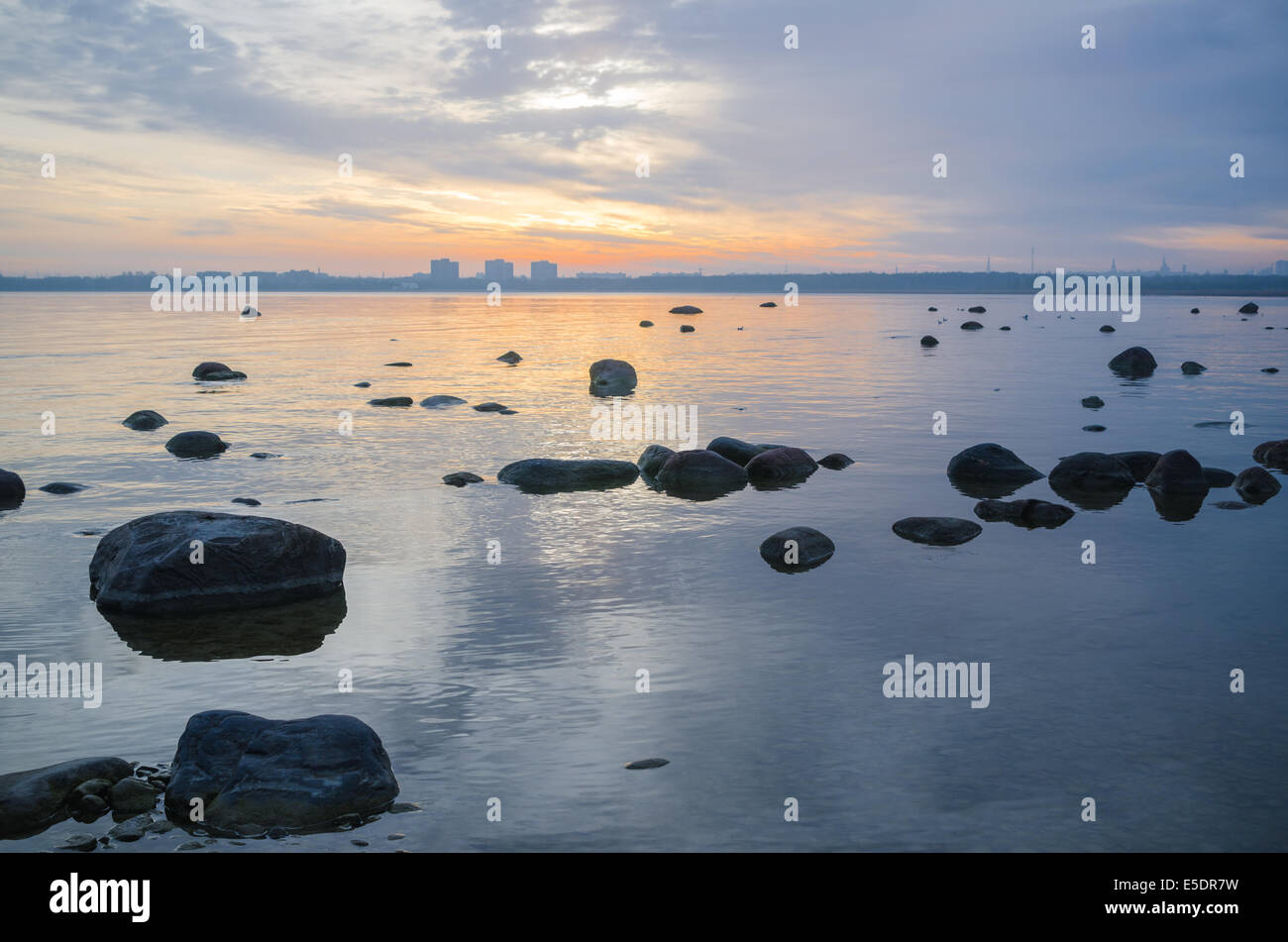 Beautiful sunrise on the sea. Views of Tallinn Stock Photo - Alamy