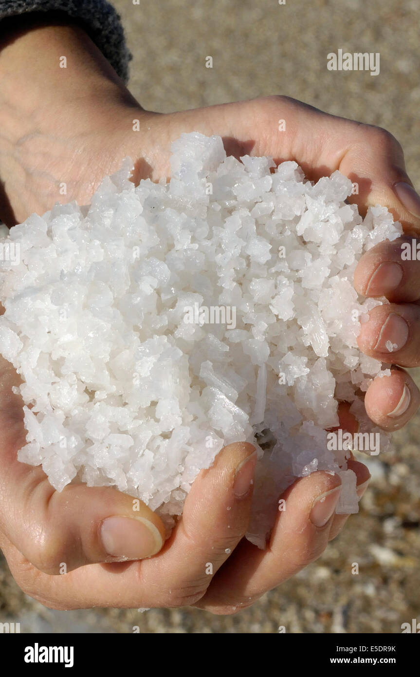 Hands full of sea salt hi-res stock photography and images - Alamy