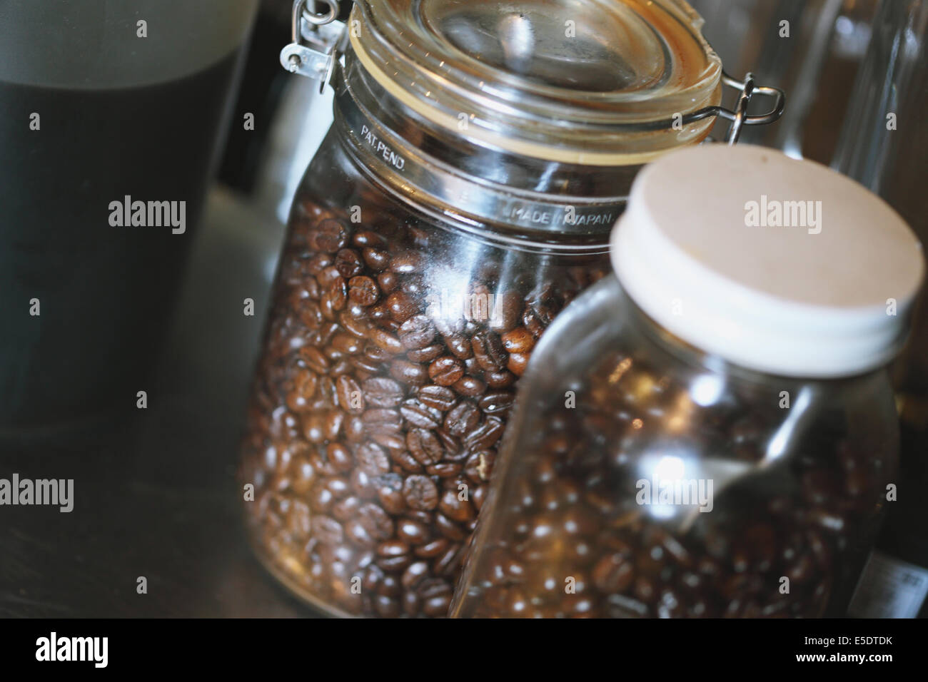 Bottled coffee beans Stock Photo - Alamy