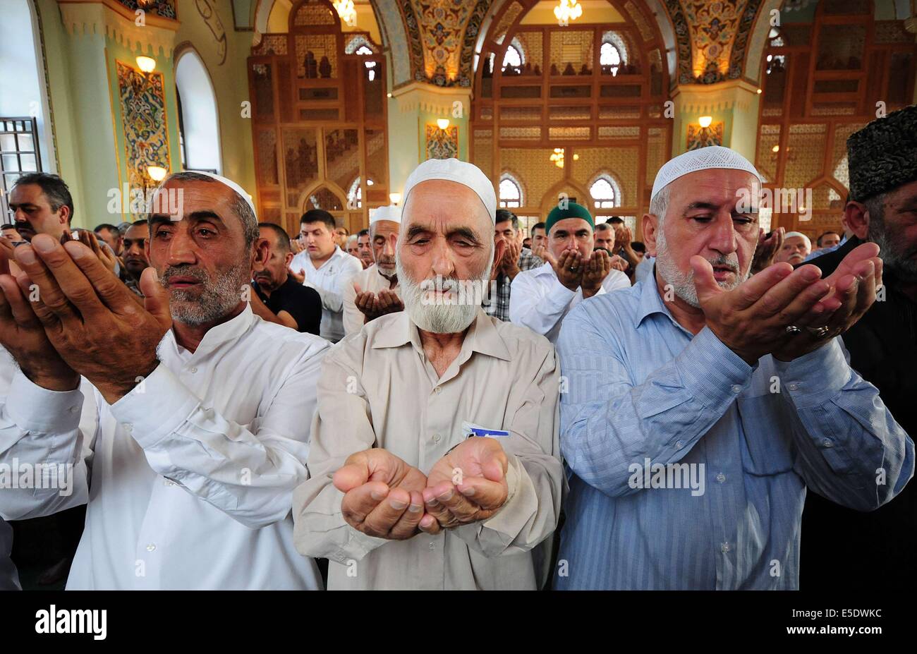 Baku, Azerbaijan. 29th July, 2014. Azerbaijani Muslims offer prayers to ...