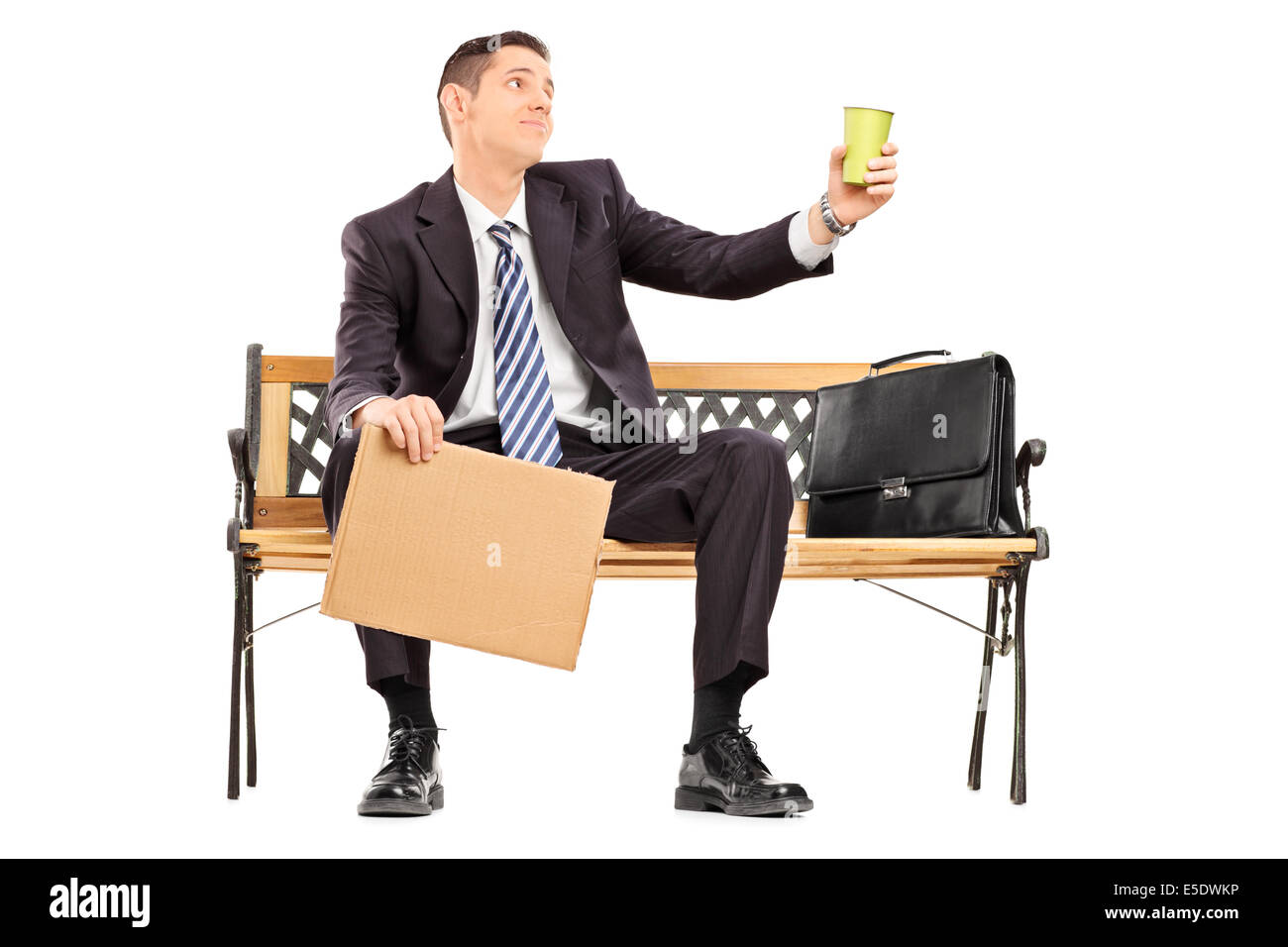 Homeless broke businessman sitting hi-res stock photography and images ...