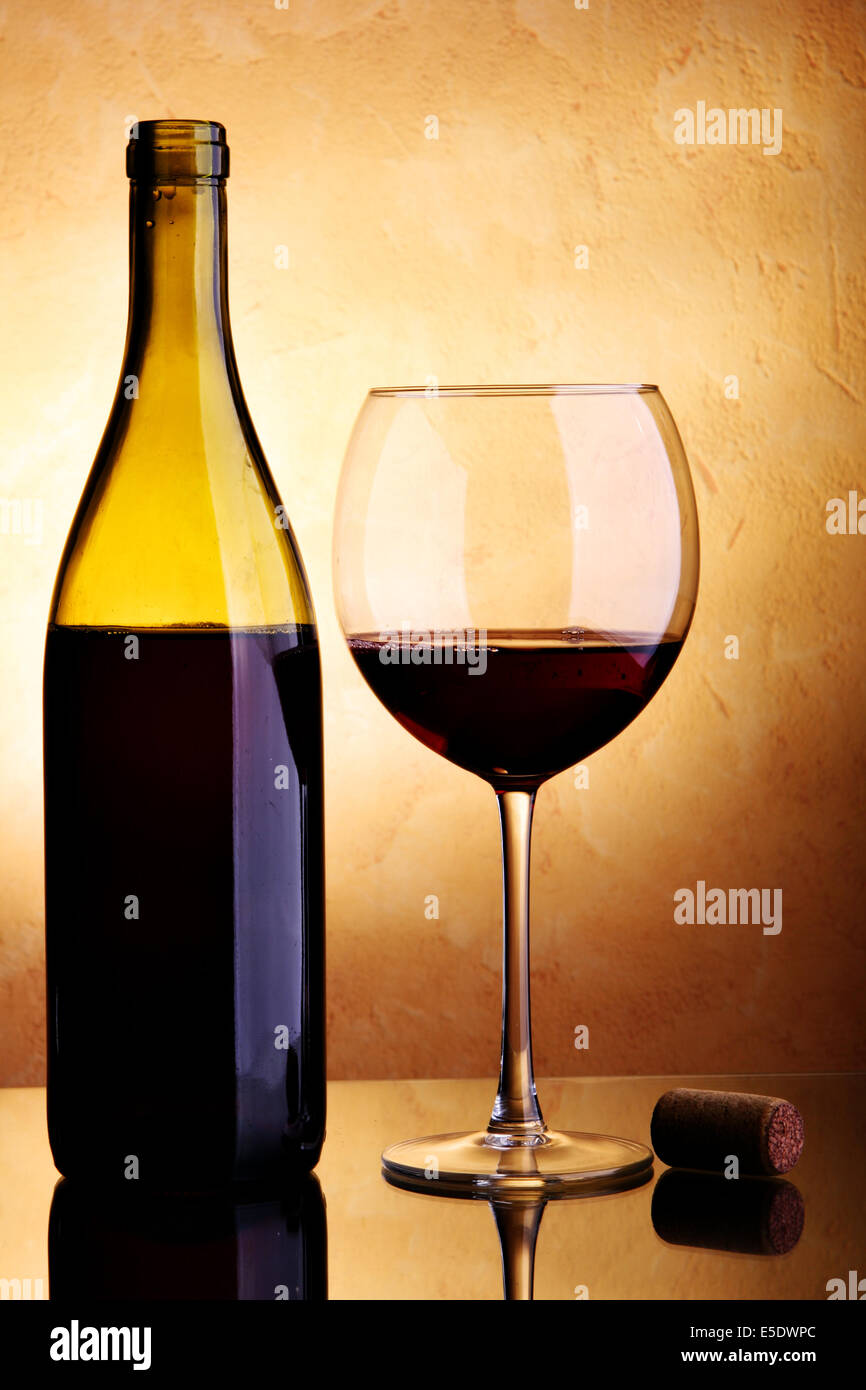 Still-life with wine bottle and glass Stock Photo - Alamy