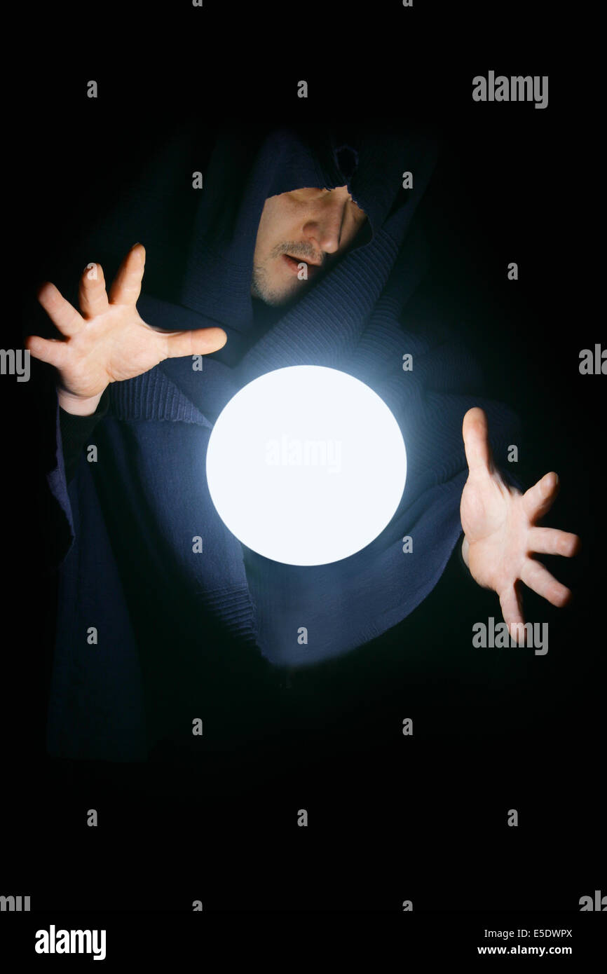 Wizard with glowing magical sphere close-up Stock Photo - Alamy