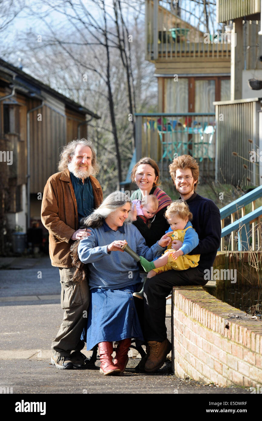 A young family with neighbouring residents at the Springhill Co-housing ...