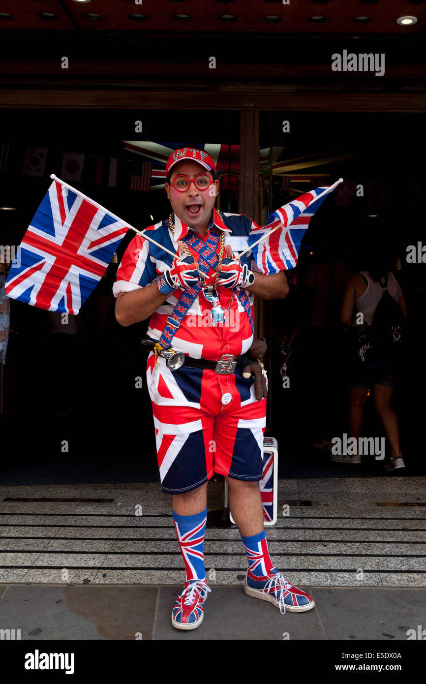 A Man In A Union Jack Costume Stands Outside The Cool Britannia ...