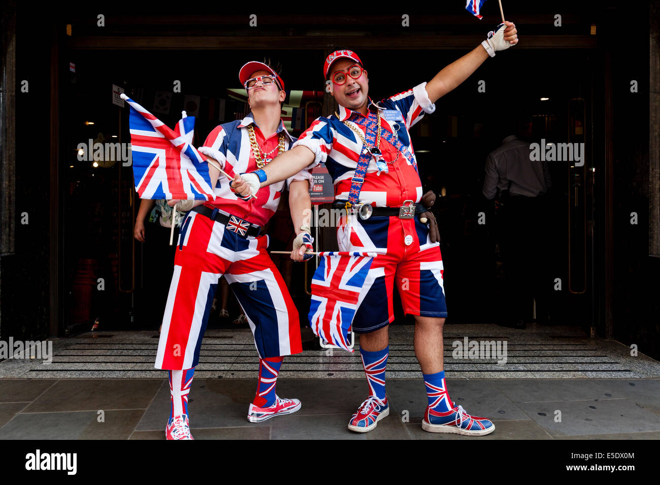 Two Men In Union Jack Costumes Standing Outside The Cool Britannia ...