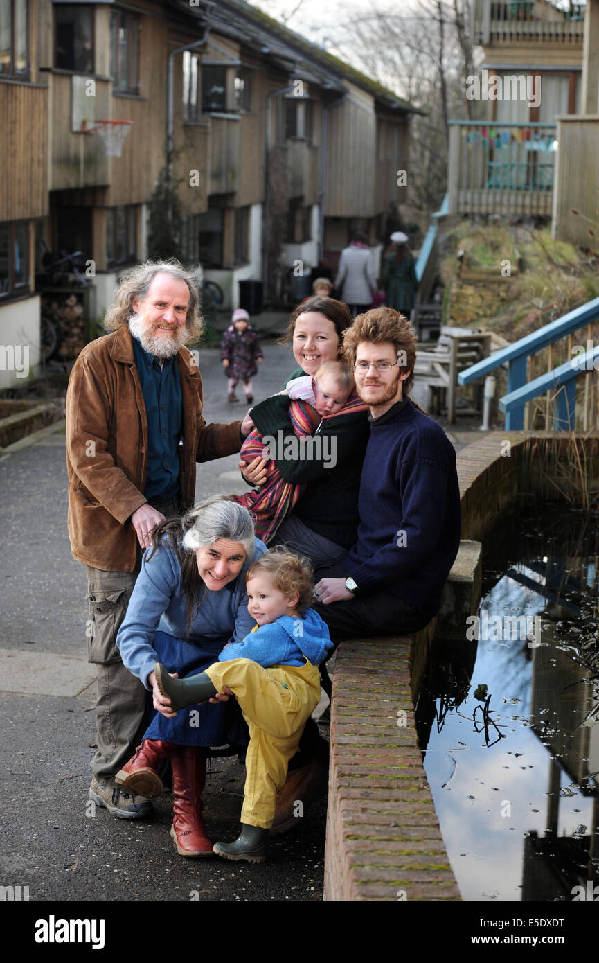 A young family with neighbouring residents at the Springhill Co-housing ...