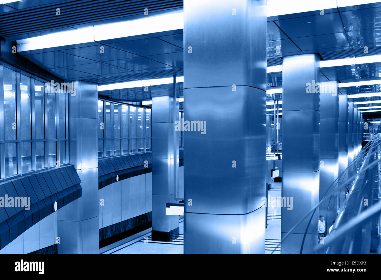 Modern interior of trade center with columns toned in blue color Stock ...