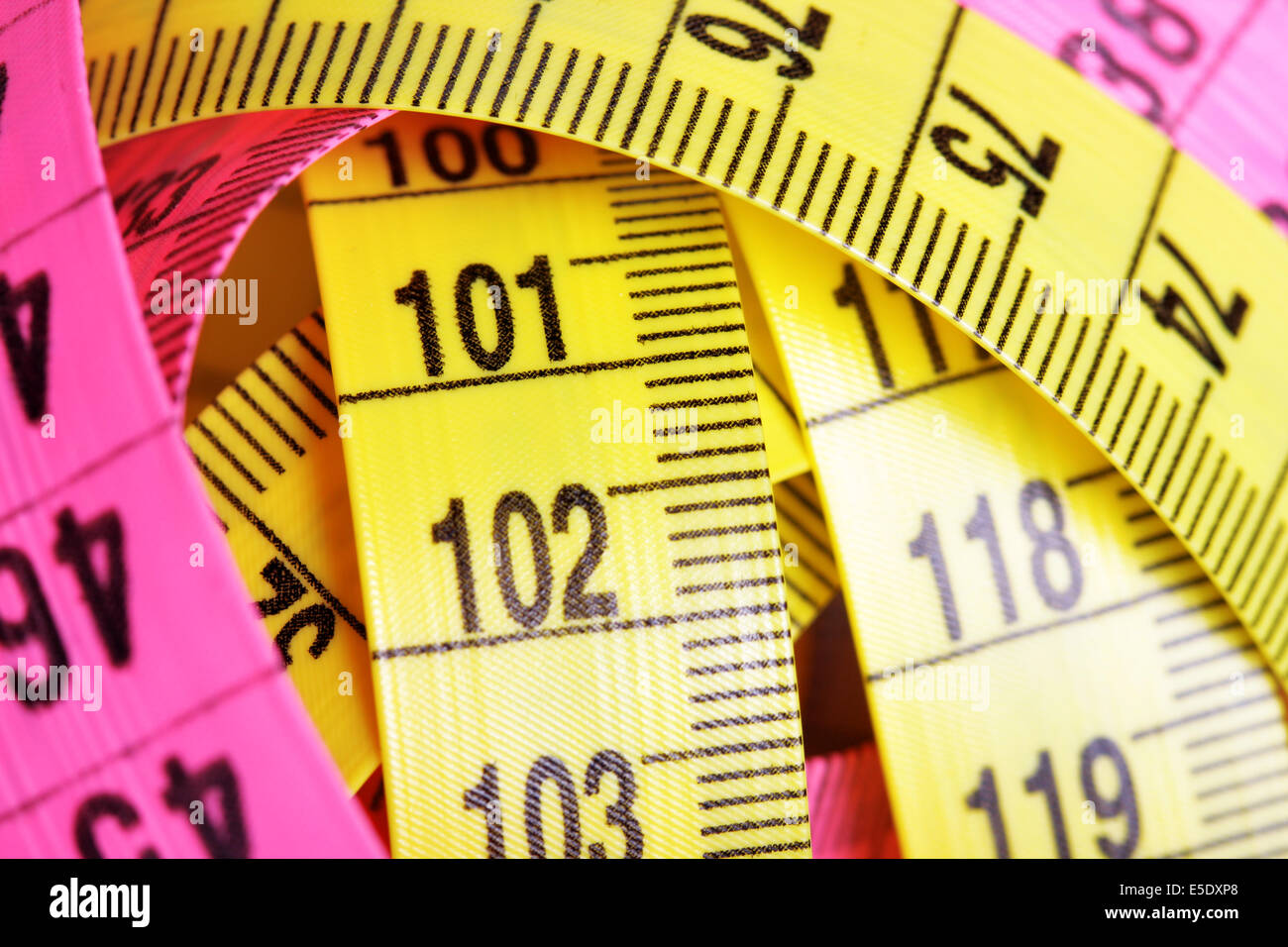 Inch scale pink measuring tape hi-res stock photography and images - Alamy
