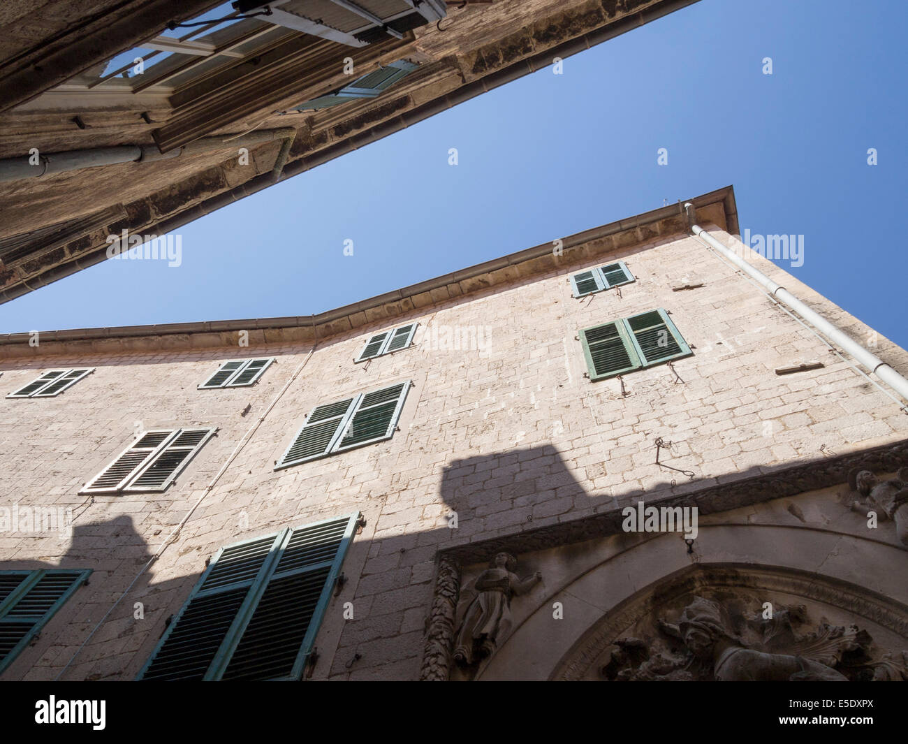 narrow space between medieval buildings in famous Kotor city in ...