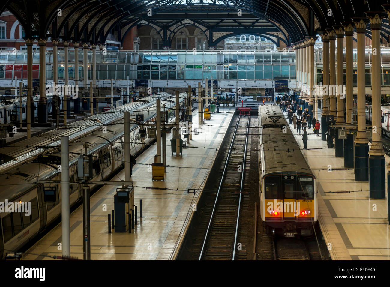 Looking down onto the main shed of Liverpool Street railway station ...