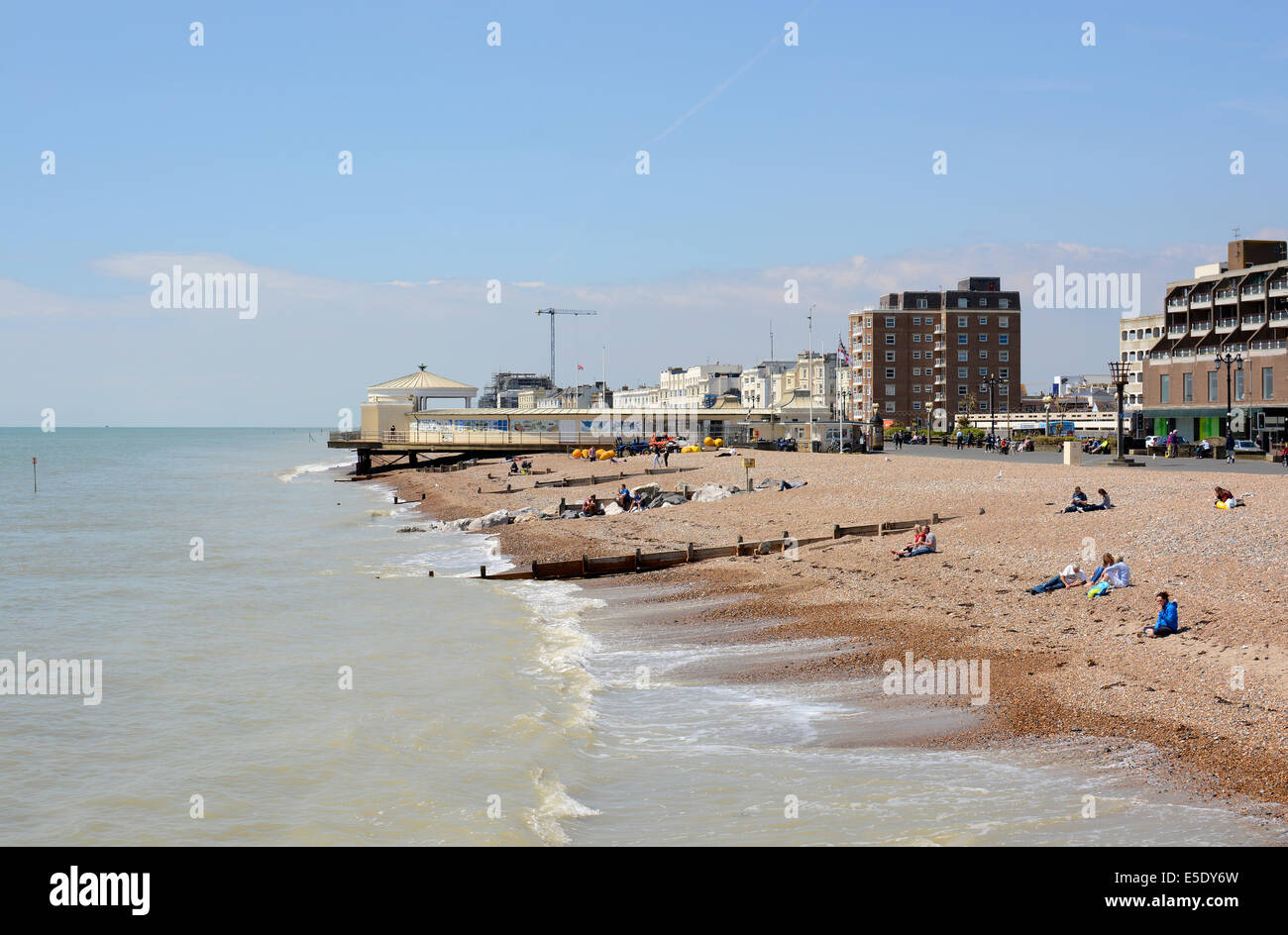 Beach and seafront promenade at Worthing in West Sussex. England. With ...