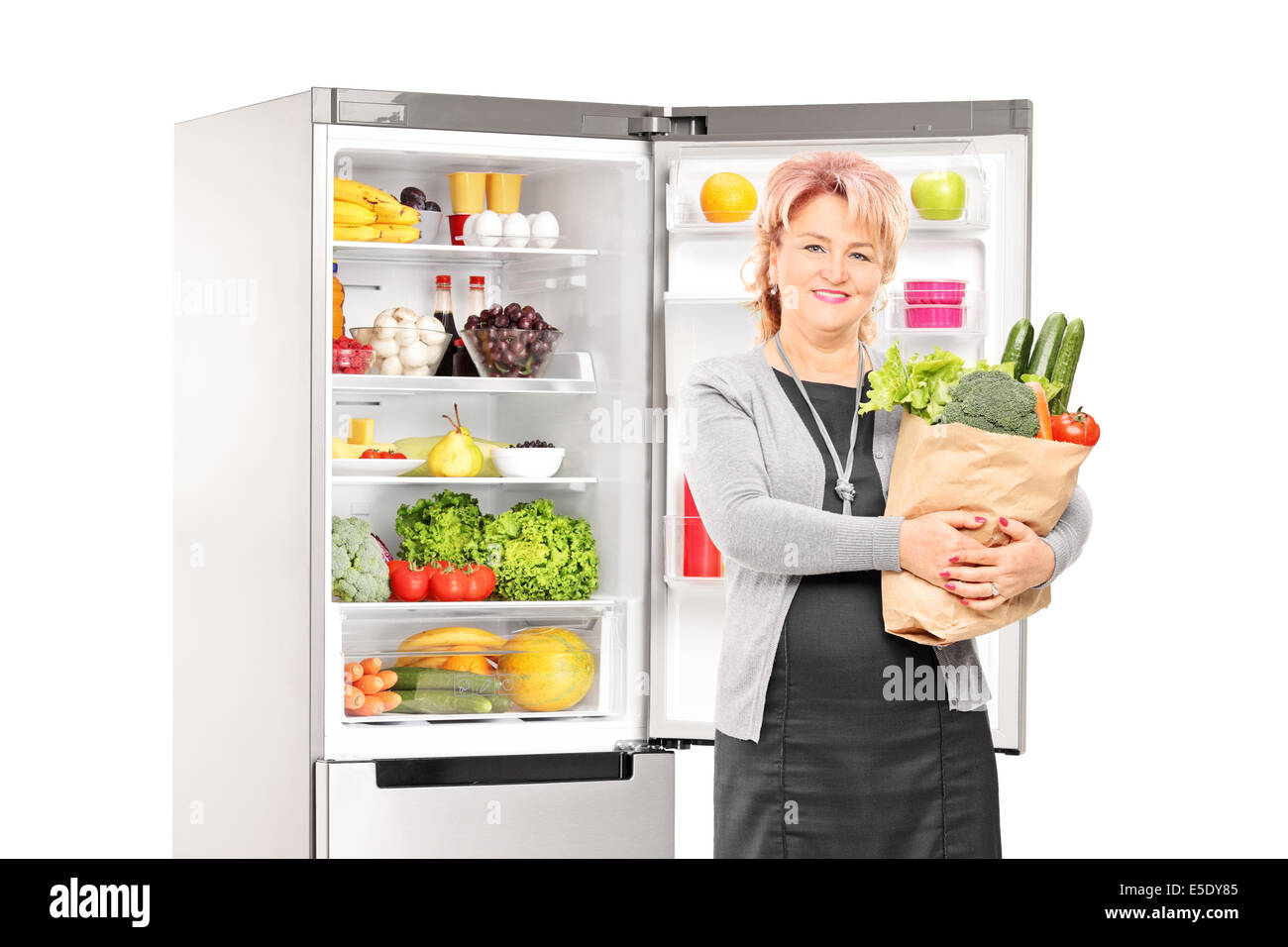 Woman looking in fridge fridge hi-res stock photography and images - Alamy
