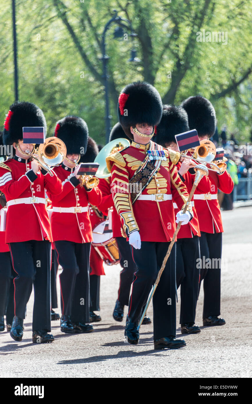 Changing of the Guard at Buckingham Palace is a ceremony of the new guard changing place with ...