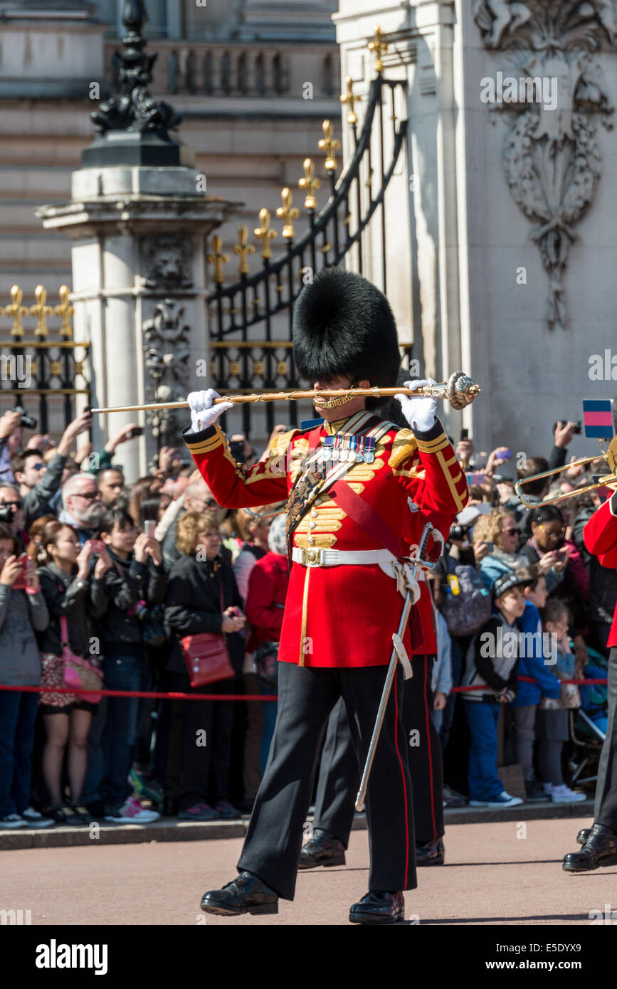Changing of the Guard at Buckingham Palace is a ceremony of the new guard changing place with ...