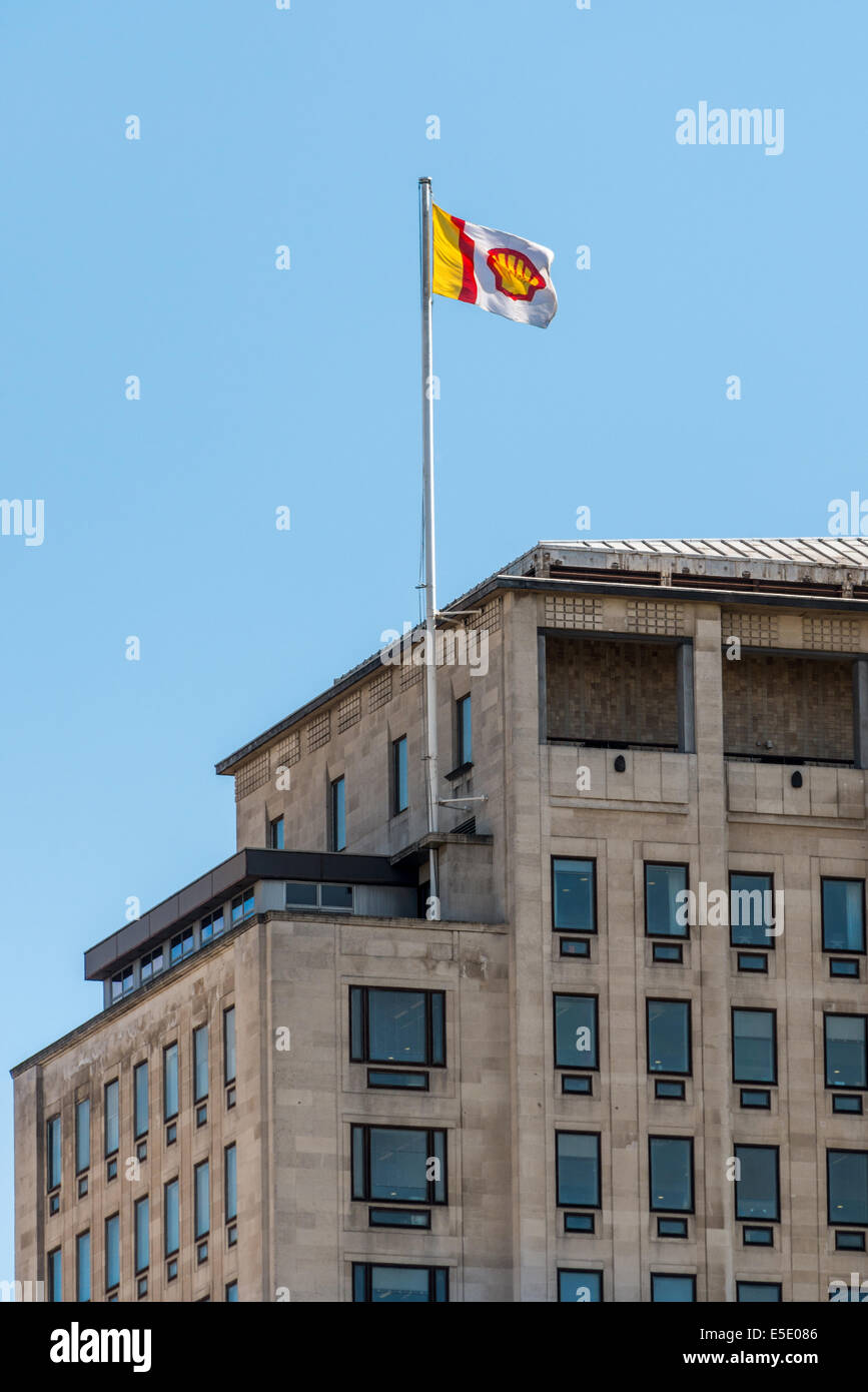 The flag of global oil company Shell flying over the Shell Centre in ...