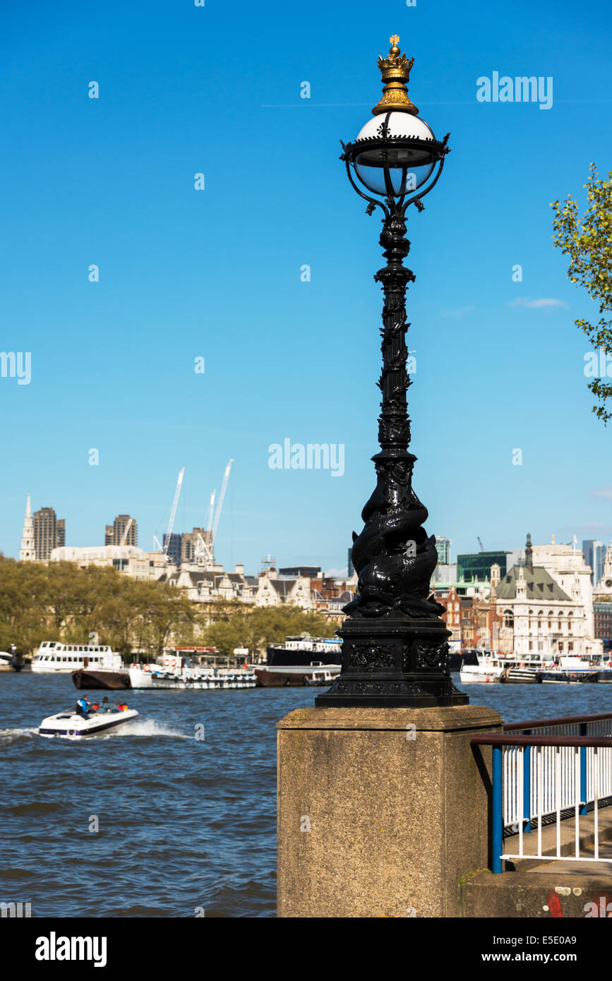 Along the River Thames embankment, London, the cast iron Victorian ...