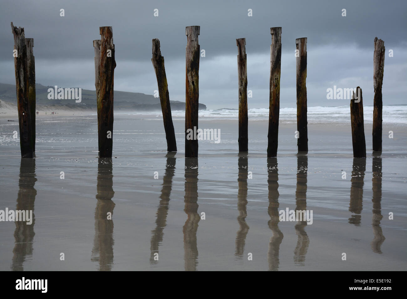 Old pier of St Clair Beach on a stormy day, Dunedin, New Zealand Stock ...