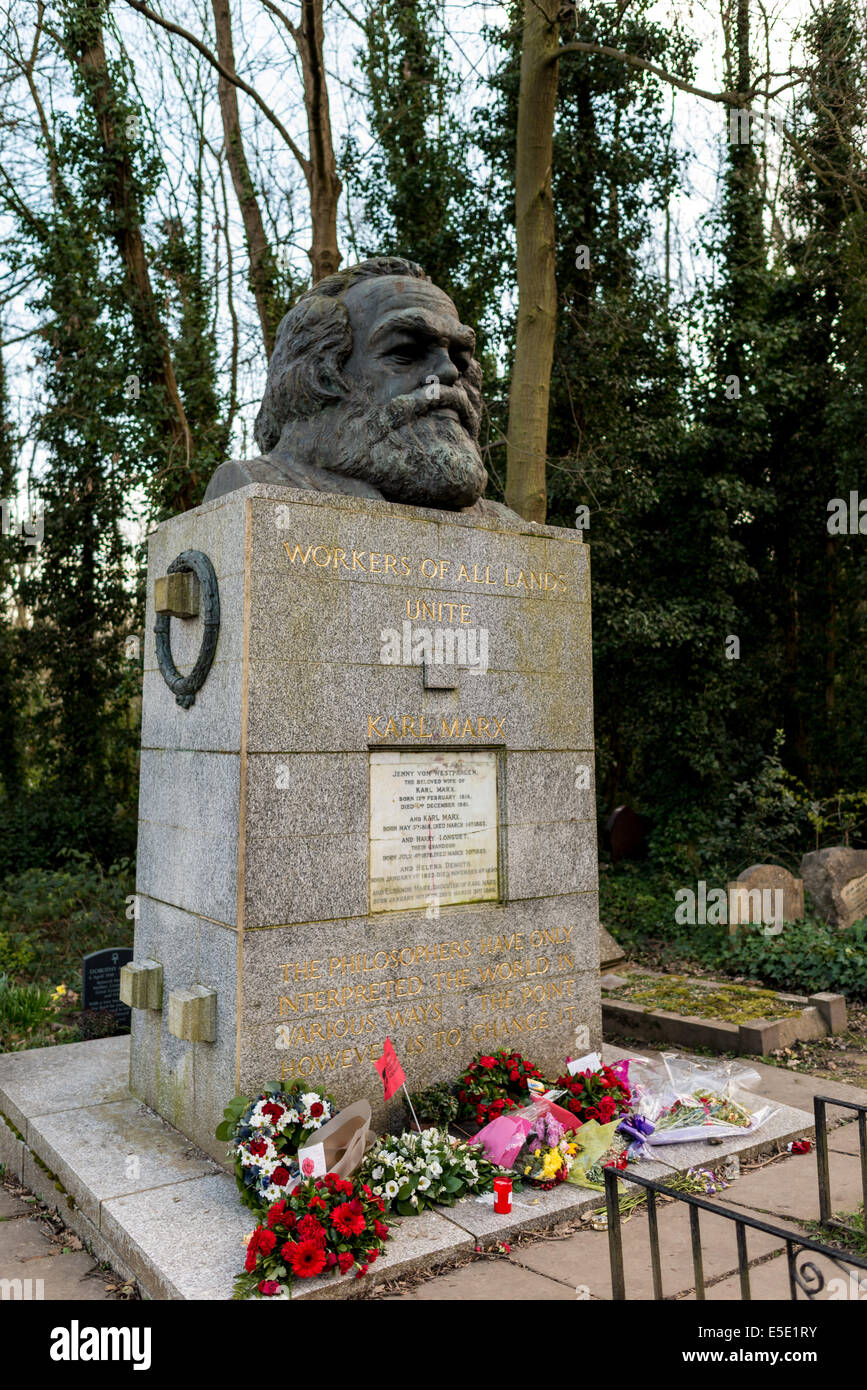 The grave of Karl Marx at Highgate cemetery. The top inscription reads ...