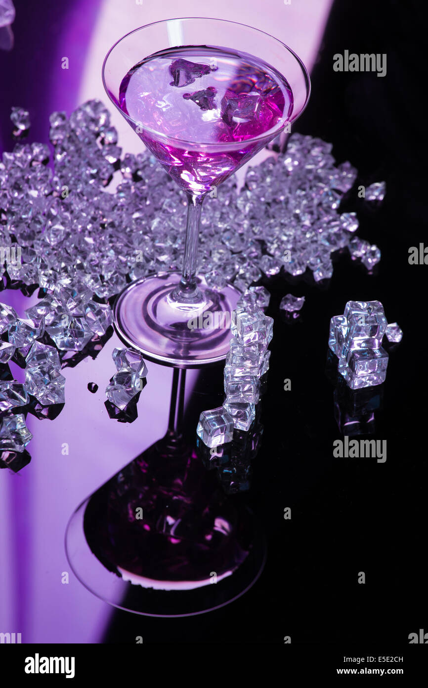Violet coctail with ice cubes Stock Photo - Alamy