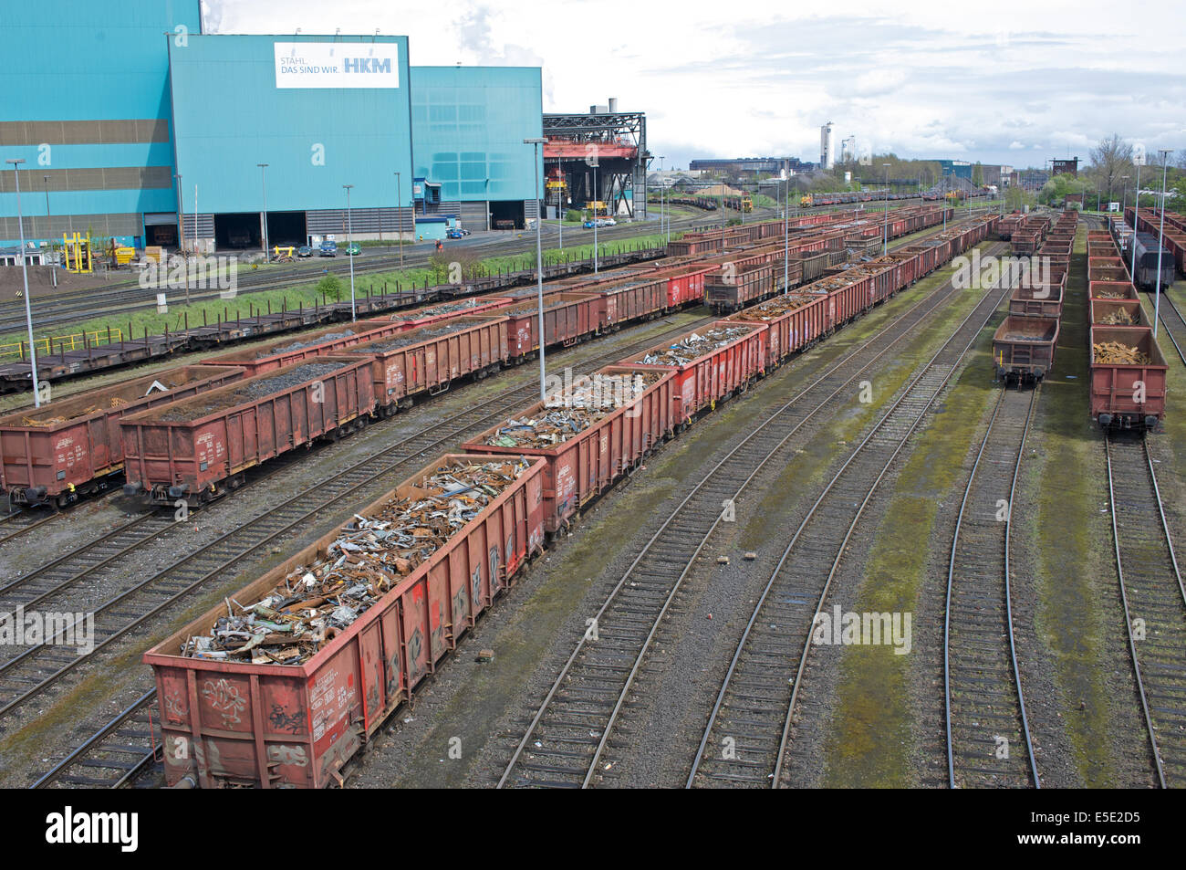 Scrap metal loaded to freight train at steel plant, Duisburg, Germany ...