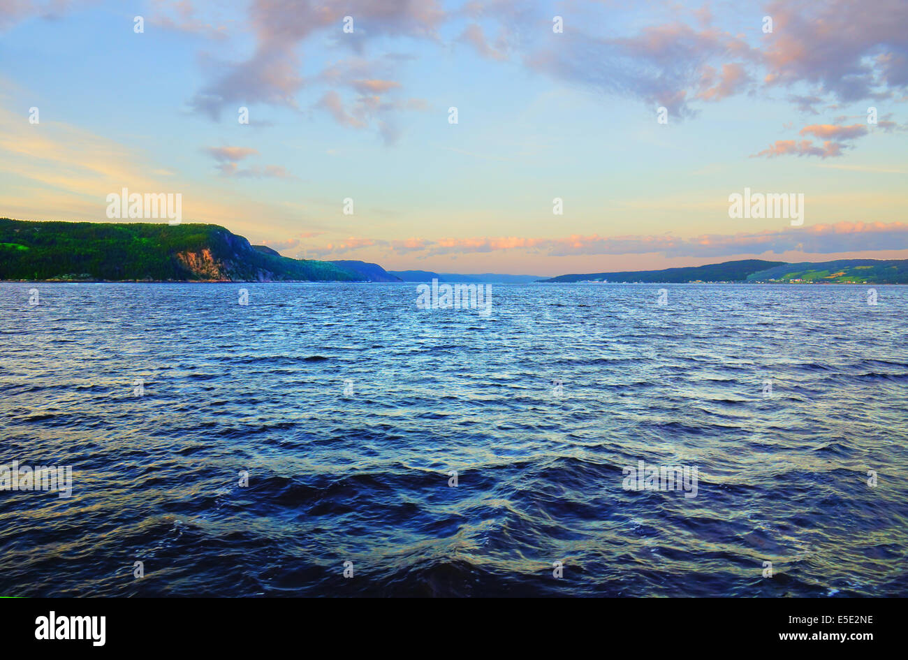 Sunset on a beautiful fjord's bay, LaBaie, Quebec, Canada Stock Photo ...