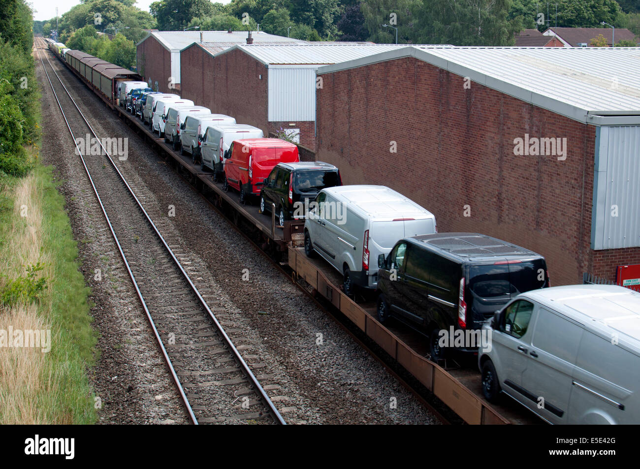 Train carrying new Ford vans Stock Photo - Alamy