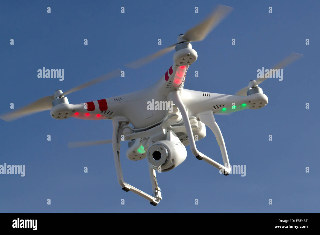 small unmanned helicopter with a camera floating in the sky Antarctica ...