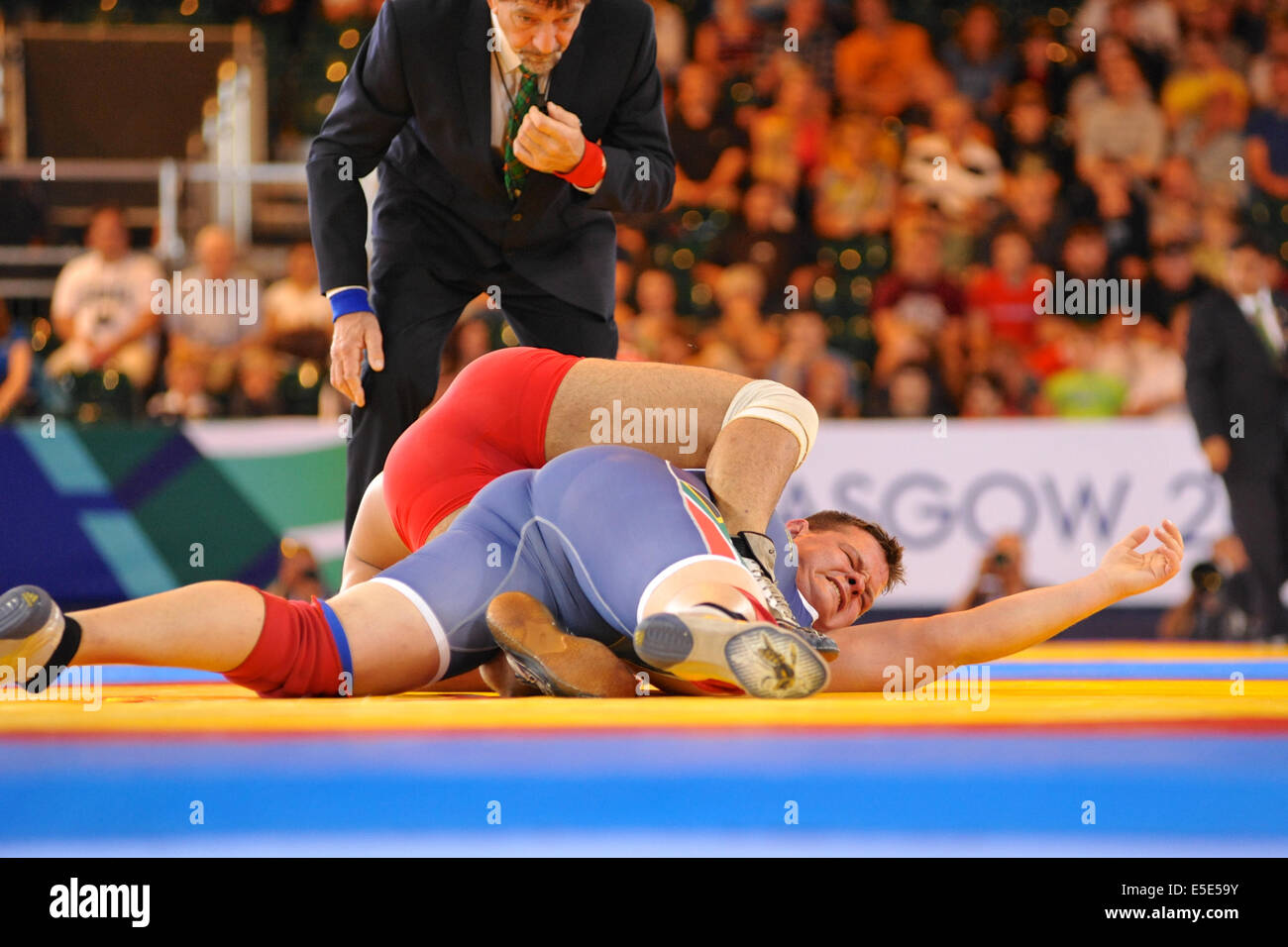 Glasgow, Scotland, UK. 29th July, 2014. Adem Digovich (RSA, blue ...