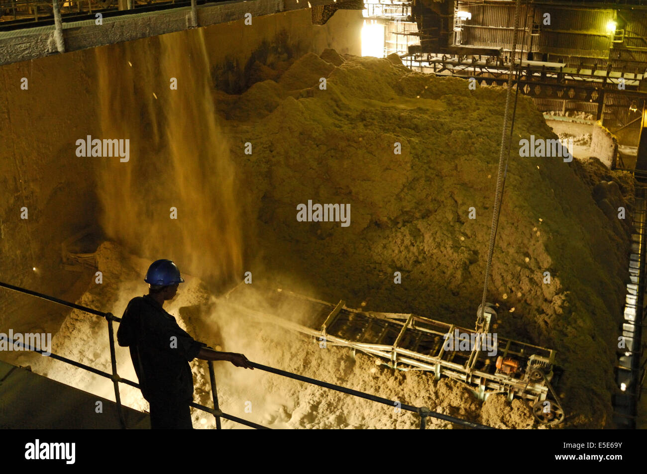 African worker, on gantry, in a sugar factory, Mumias, Kenya, Africa ...