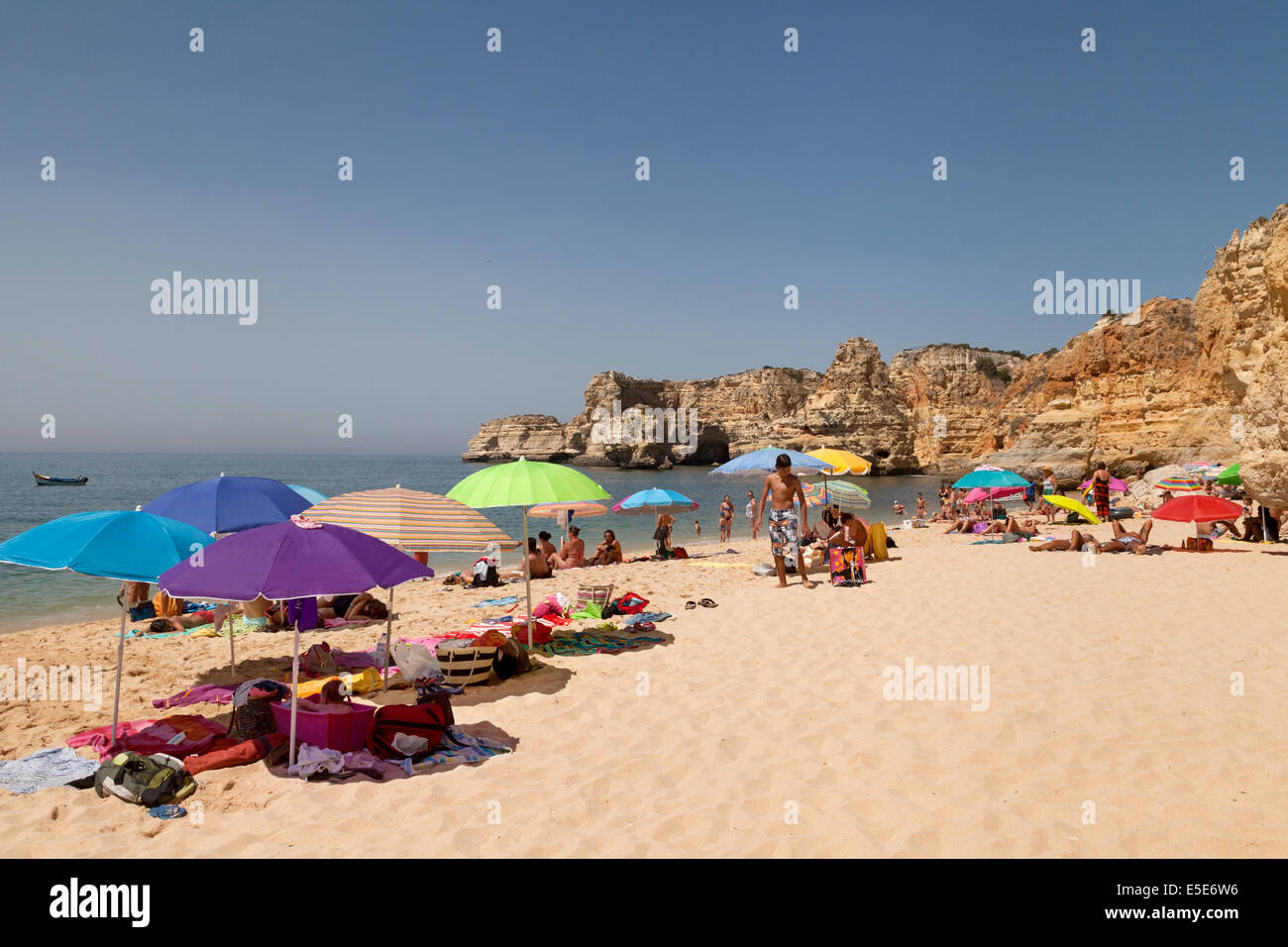 Portugal beach sunbathing hi-res stock photography and images - Alamy